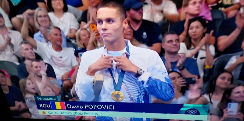 Cursa pentru istorie! Inotatorul David Popovici a castigat medalia de aur in proba de 200 metri ...